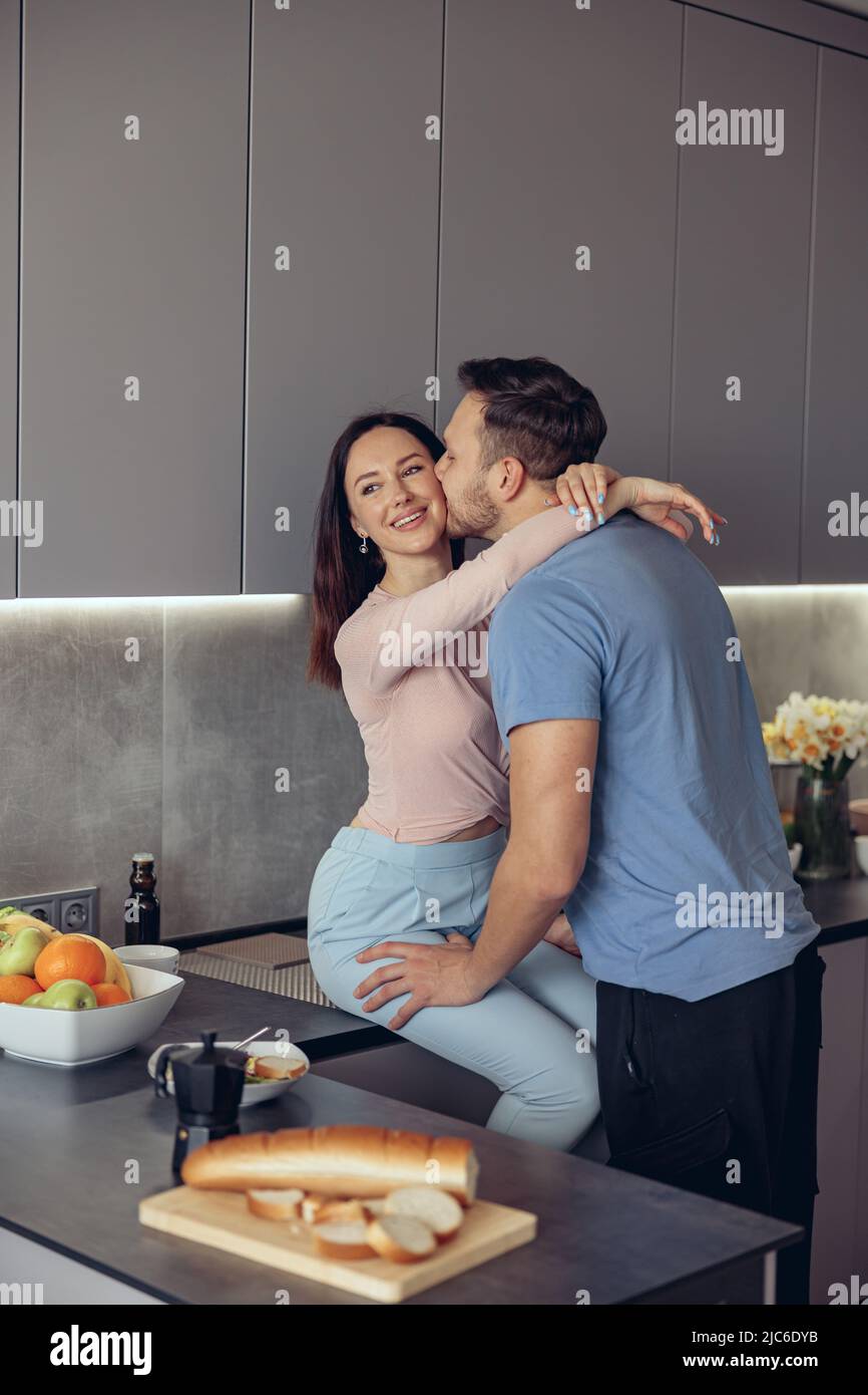 Caucasian Handsome Man Kissing Beauiful Woman Couple Standing In