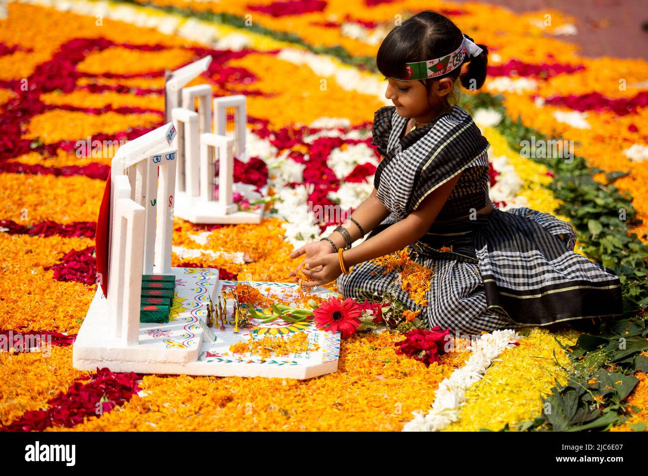 A girl child pays homage to the martyrs of Language Movement in 1952 ...