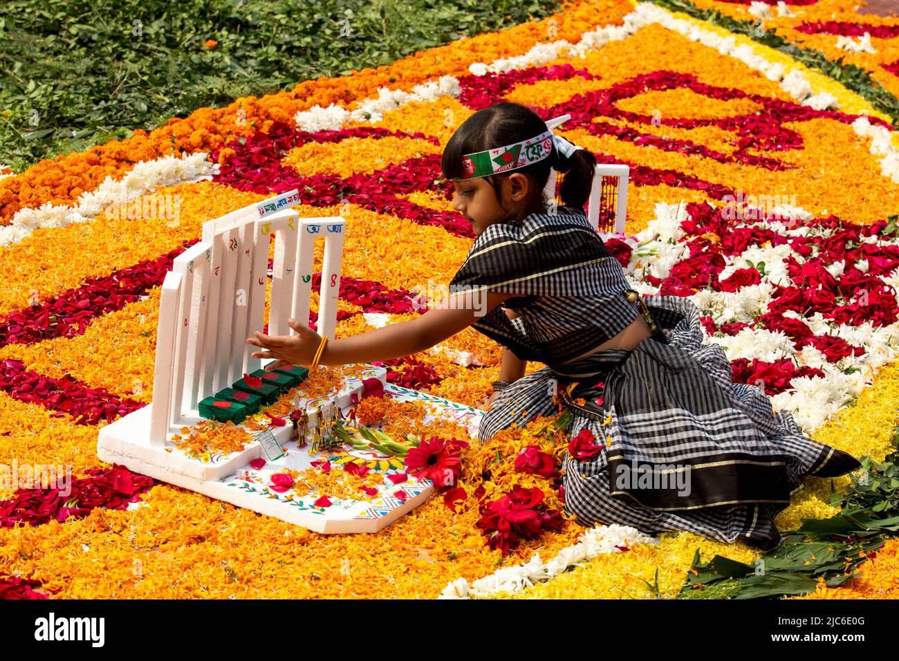 A girl child pays homage to the martyrs of Language Movement in 1952 ...