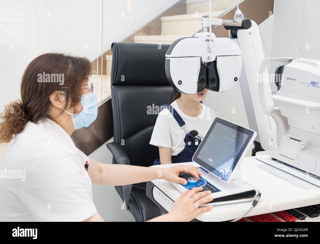 SUZHOU, CHINA - JUNE 5, 2022 - An optician center checks and corrects ...