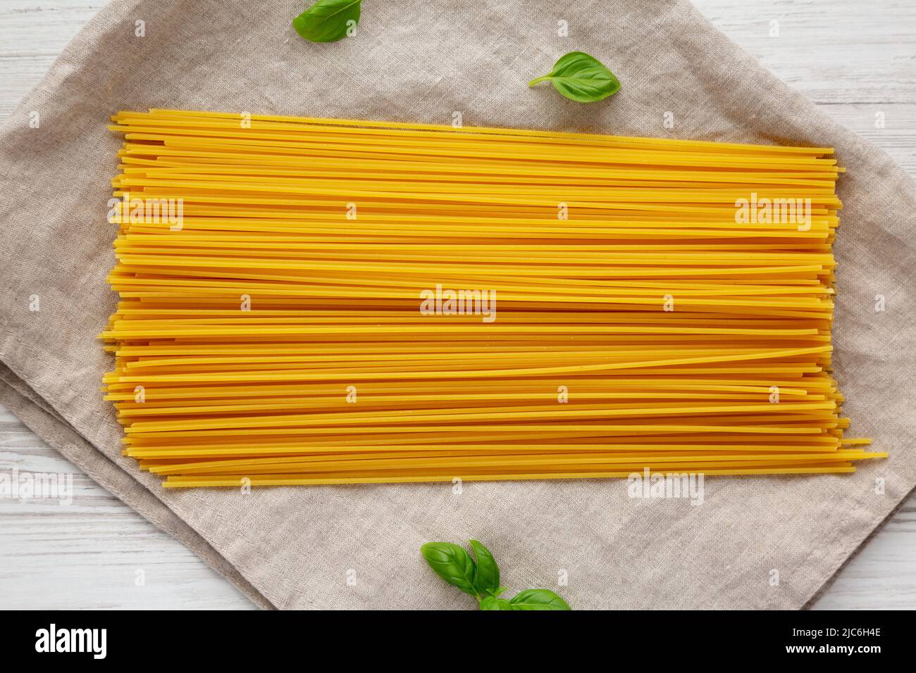 Raw Organic Spaghetti Pasta in a Bunch, top view. Flat lay, from above ...