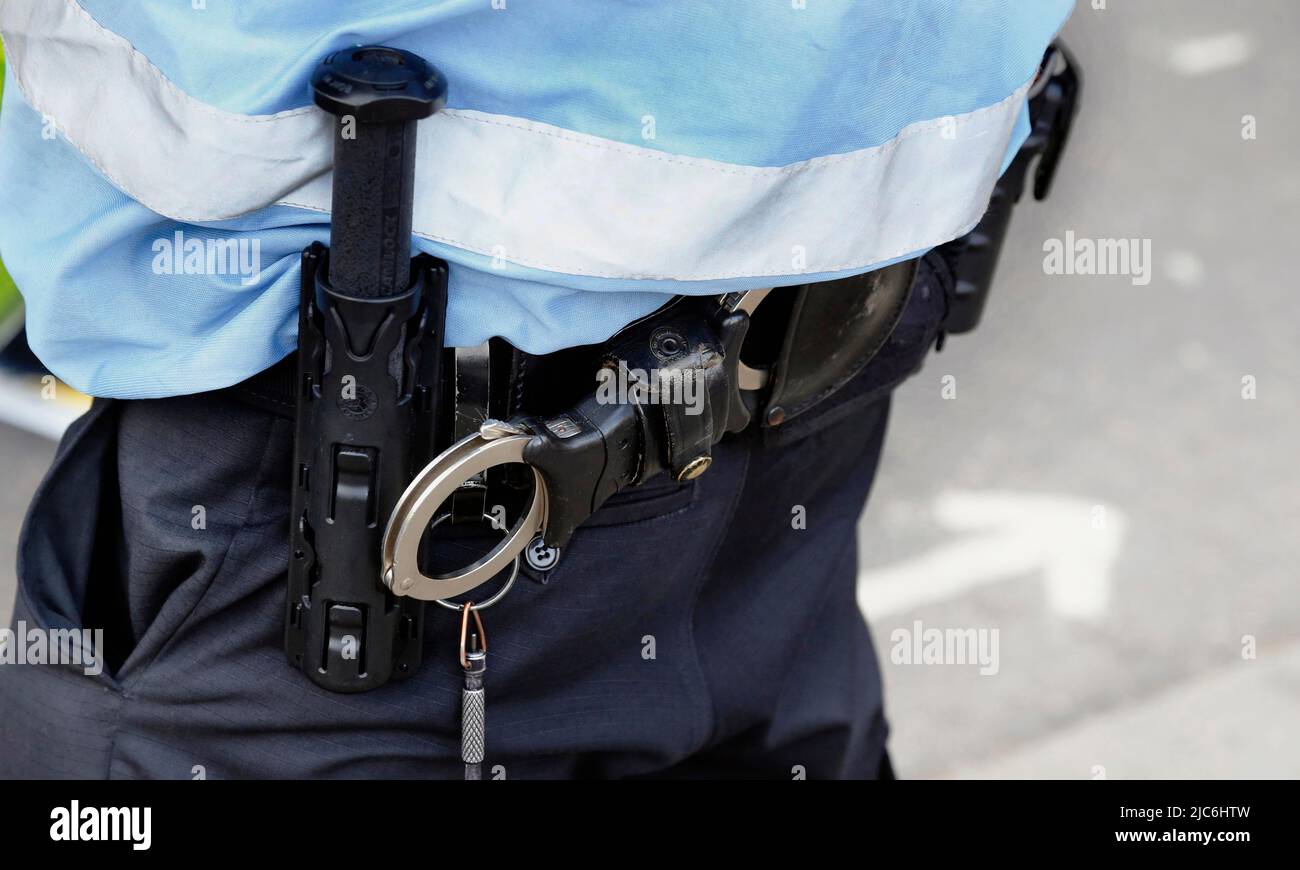 England, London, Trafalgar Square, Police liaison officer, light blue ...