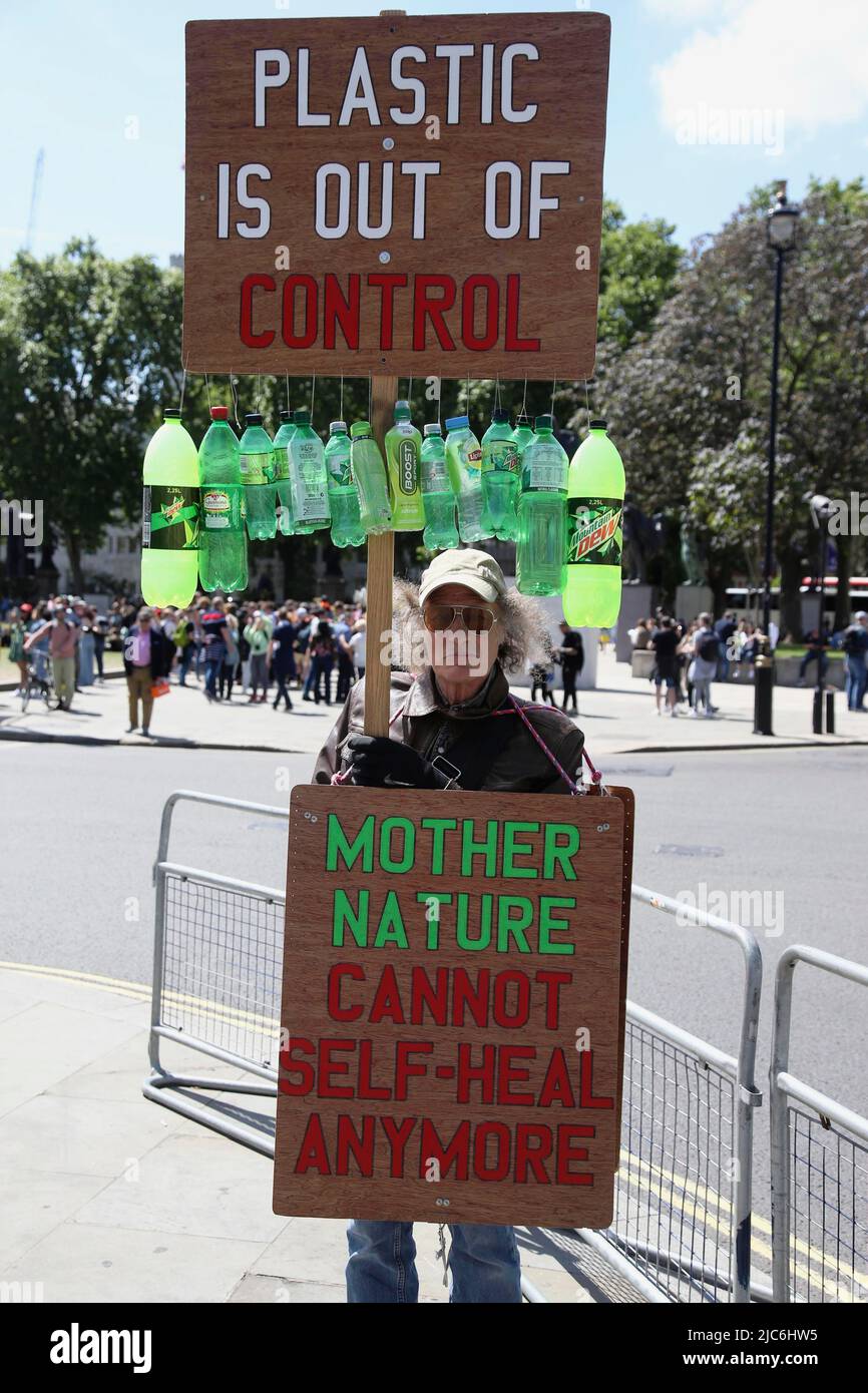 England, London, Parliament Square, Environmental protestor against ...