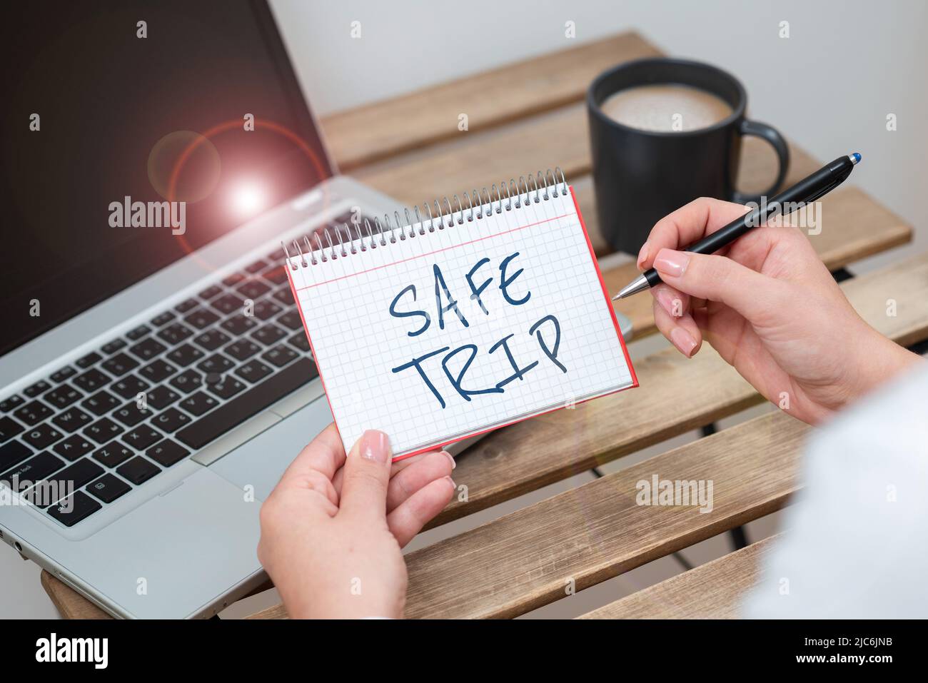 Sign displaying Safe Trip. Word for wishing someone to reach his ...