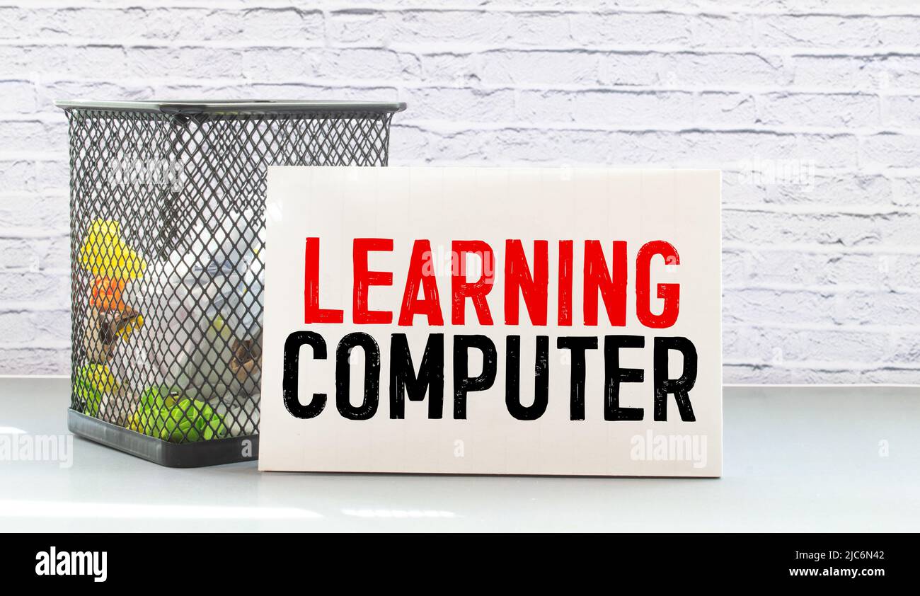 Hand with computer mouse and word Learn - education concept Stock Photo ...