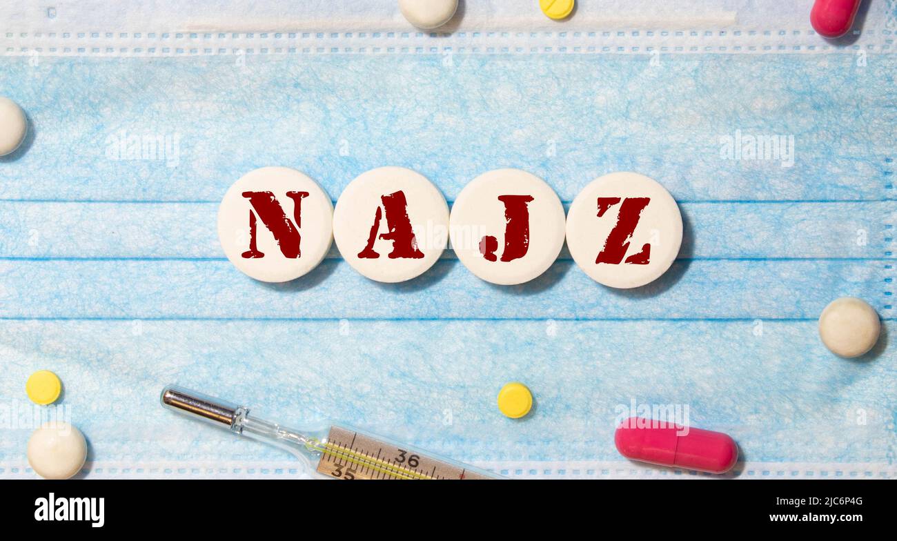 name of pain reliever NAJZ written on round white tablets Stock Photo ...