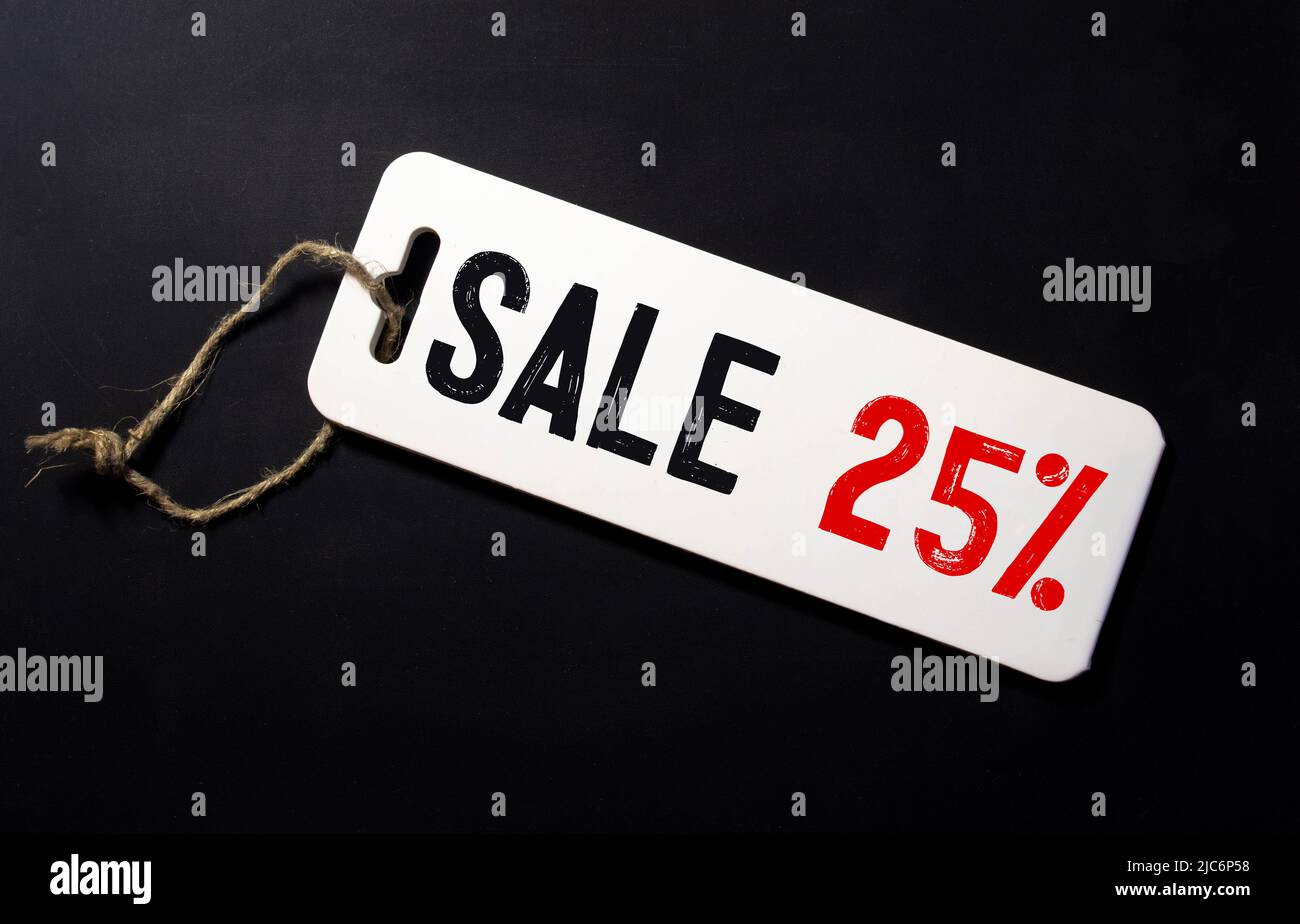 Sale printed with typewriter font on price tag sticker isolated on ...