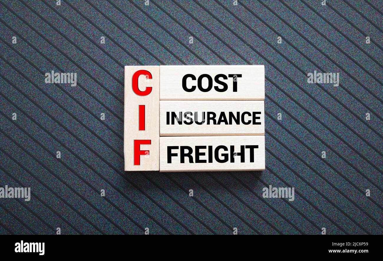 Word CIF. Wooden small cubes with letters isolated on white background ...