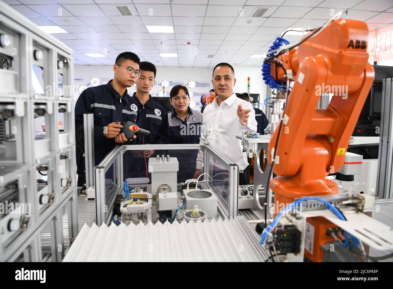 LUZHOU, CHINA - JUNE 3, 2022 - Teachers guide the team of Luzhou ...