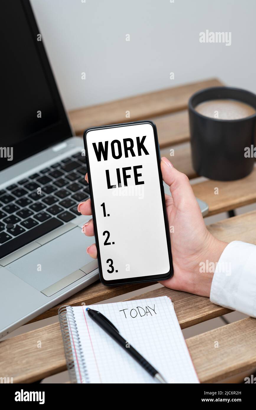 Hand writing sign Work Life. Business idea An everyday task to ern ...