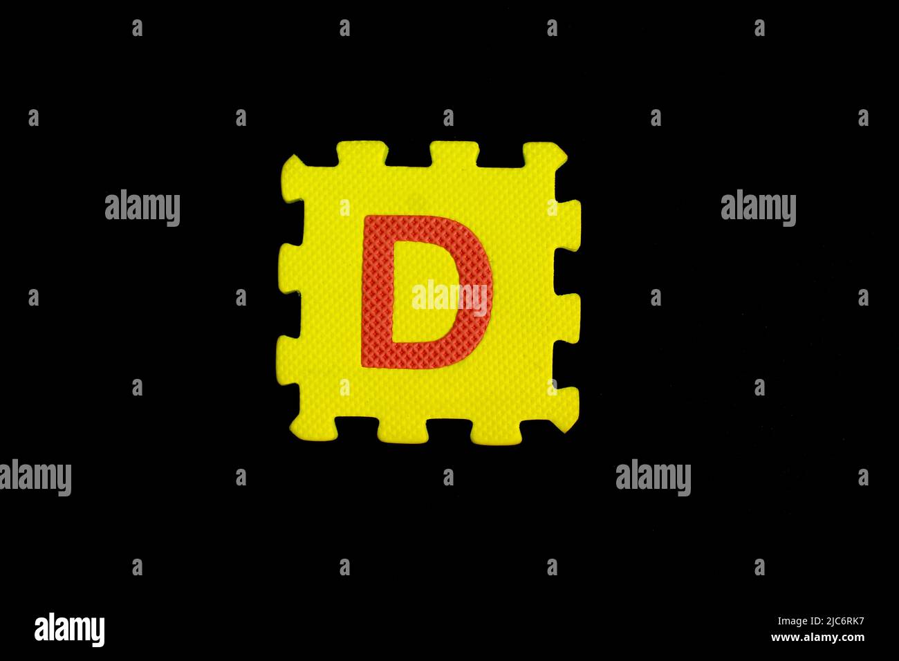 Colorful alphabet puzzle isolated on black background. alphabet ...