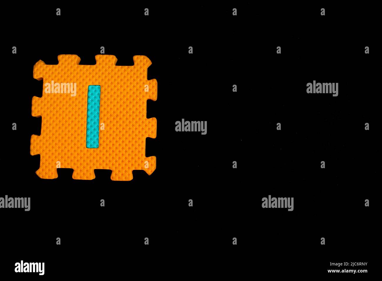 Colorful alphabet puzzle isolated on black background. alphabet ...