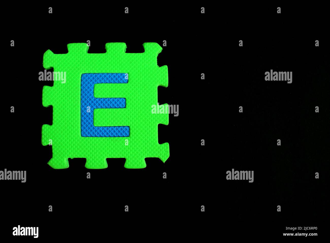 Colorful alphabet puzzle isolated on black background. alphabet ...