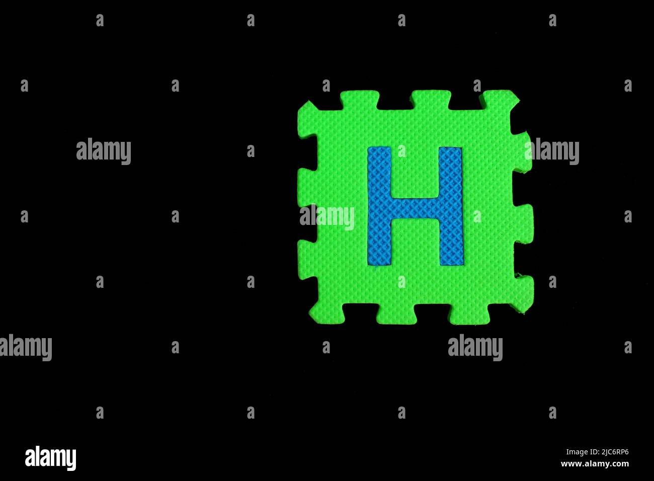 Colorful alphabet puzzle isolated on black background. alphabet ...