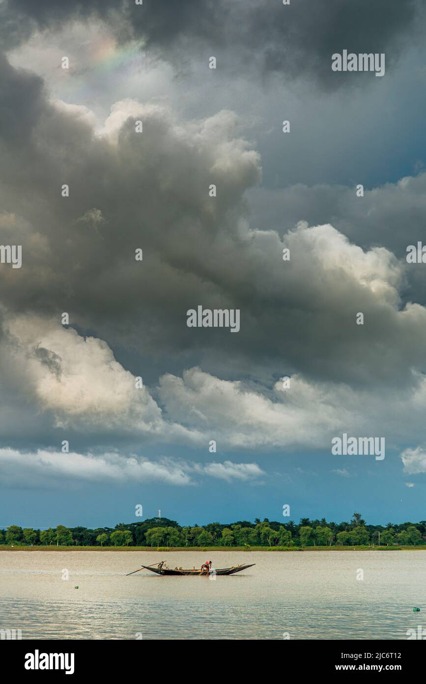Some fisherman are going to deep Rupsa river to catch Hilsha fish ...