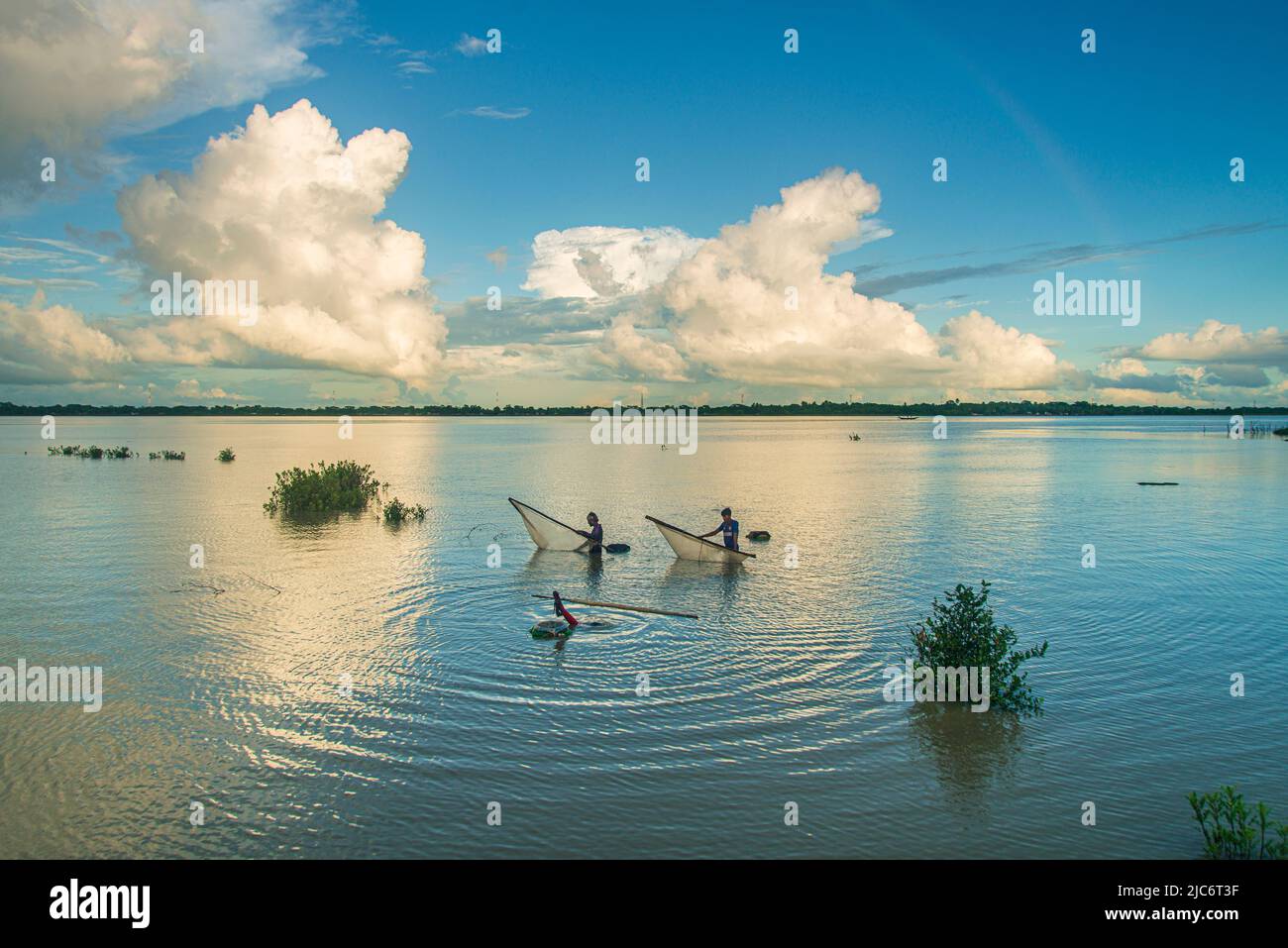 Some fisherman are going to deep Rupsa river to catch Hilsha fish ...
