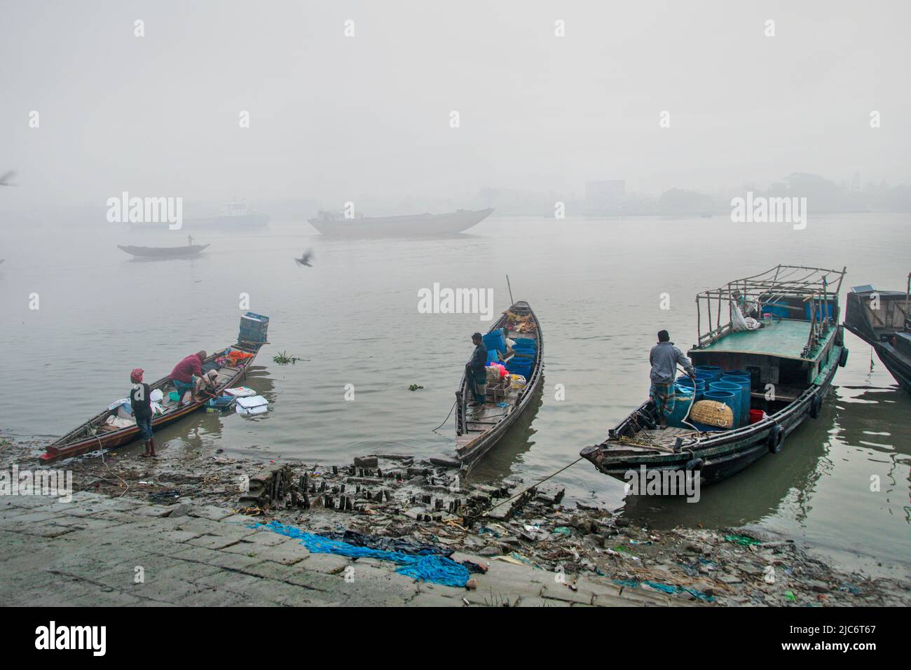 Some fisherman are going to deep Rupsa river to catch Hilsha fish ...