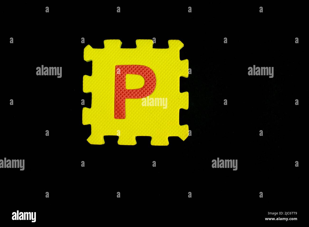 Colorful alphabet puzzle isolated on black background. alphabet ...