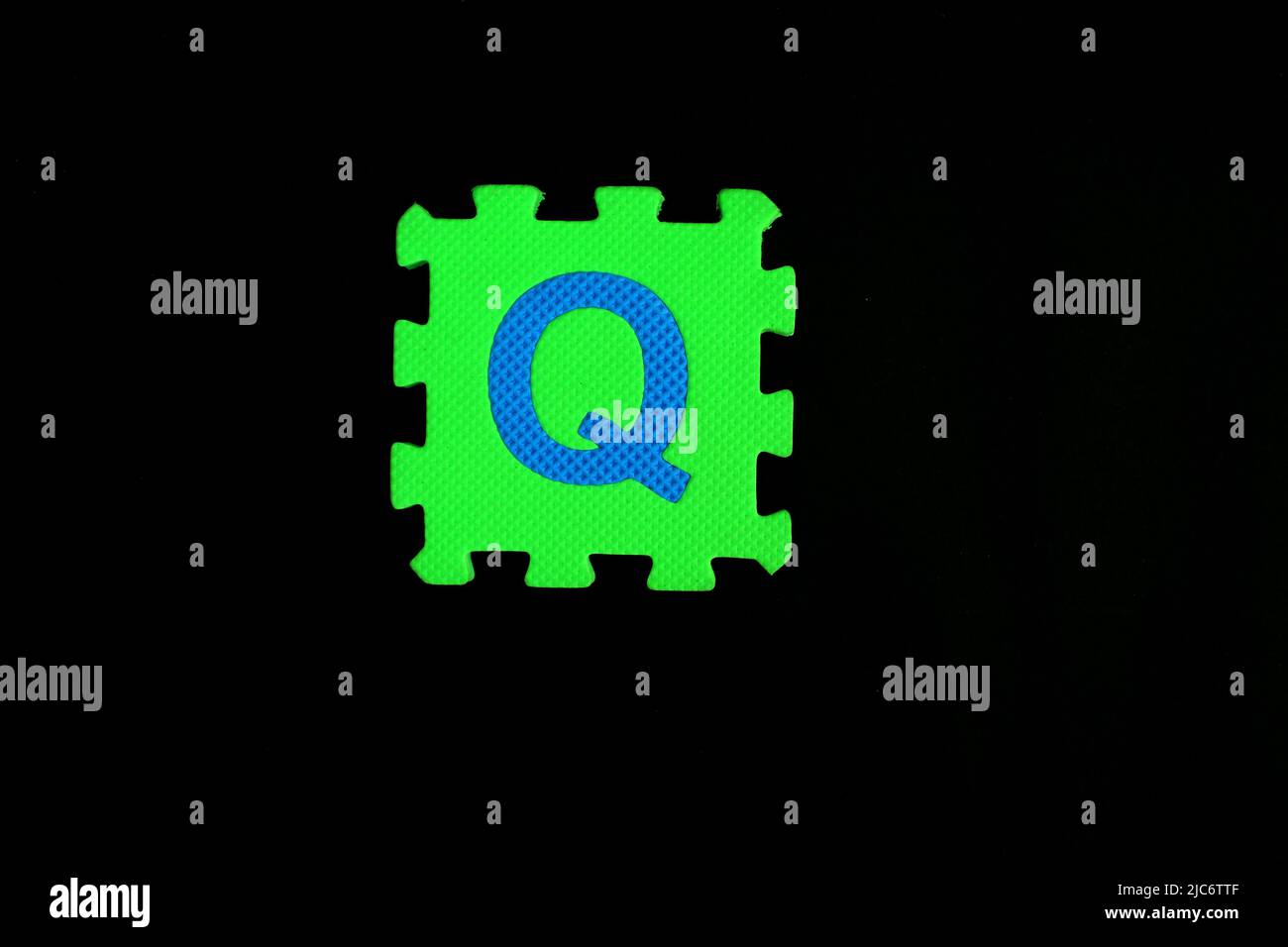 Colorful alphabet puzzle isolated on black background. alphabet ...