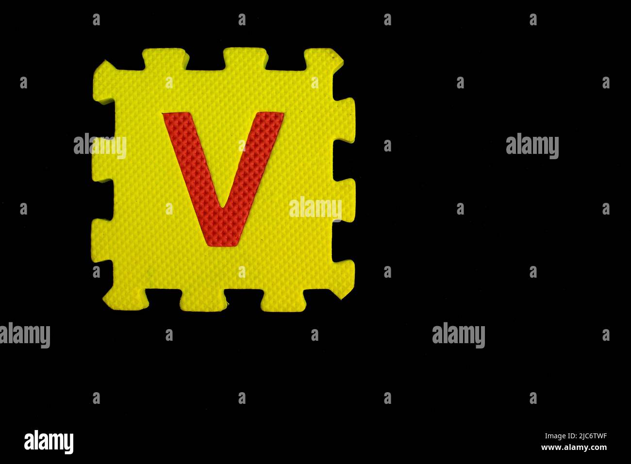 Colorful alphabet puzzle isolated on black background. alphabet ...