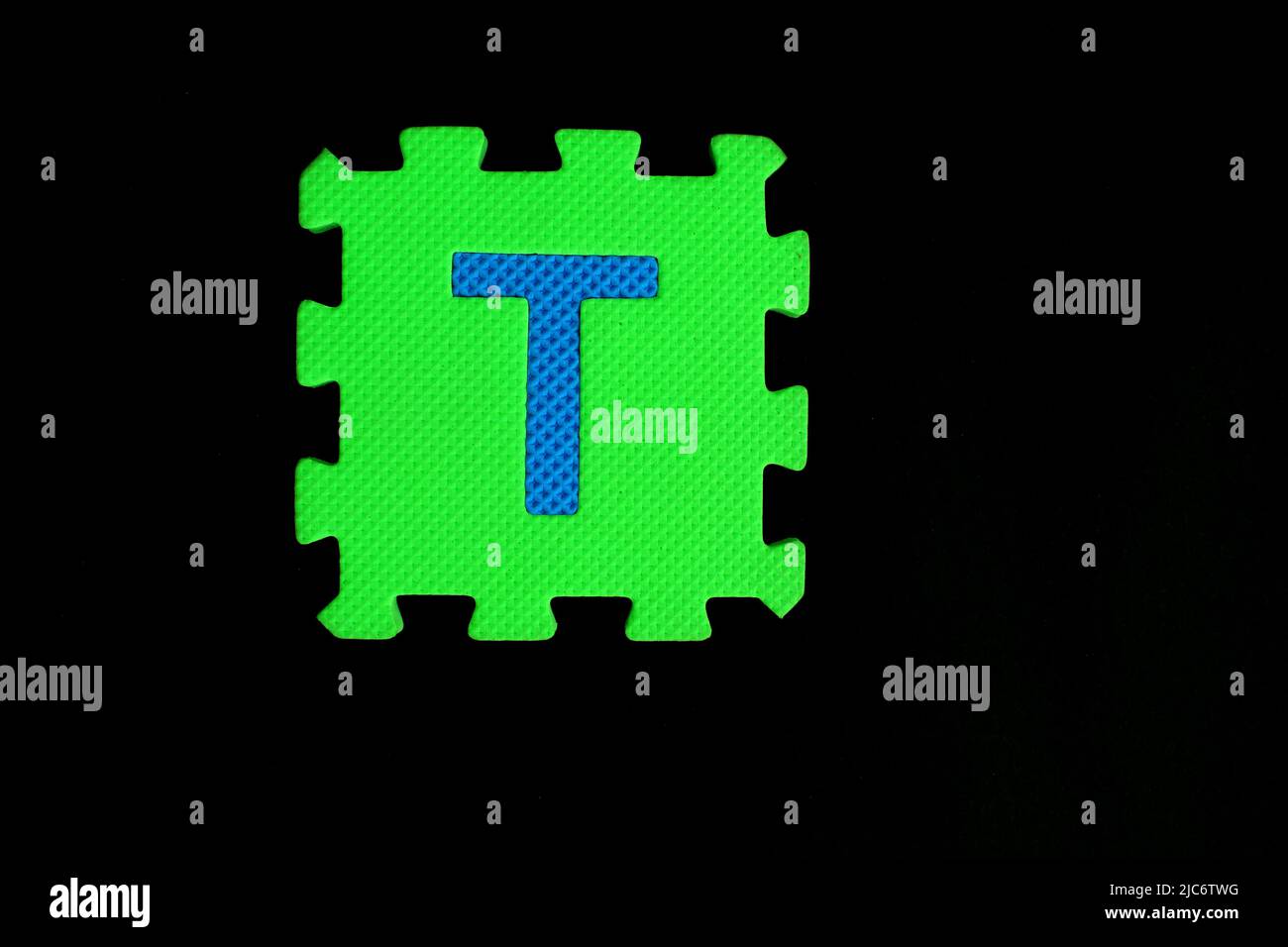 Colorful alphabet puzzle isolated on black background. alphabet ...