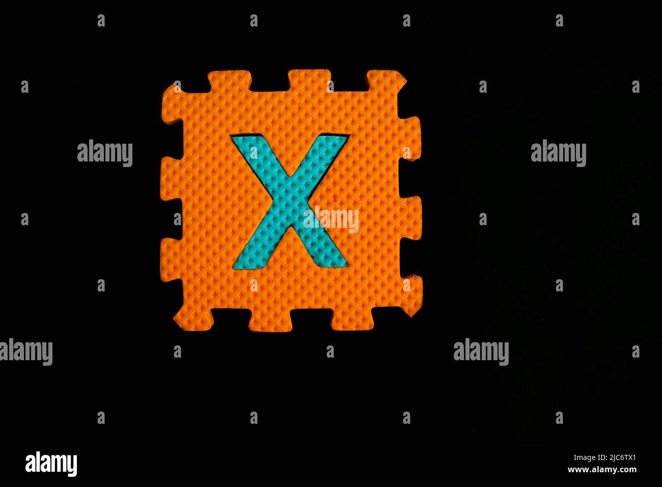 Colorful alphabet puzzle isolated on black background. alphabet ...