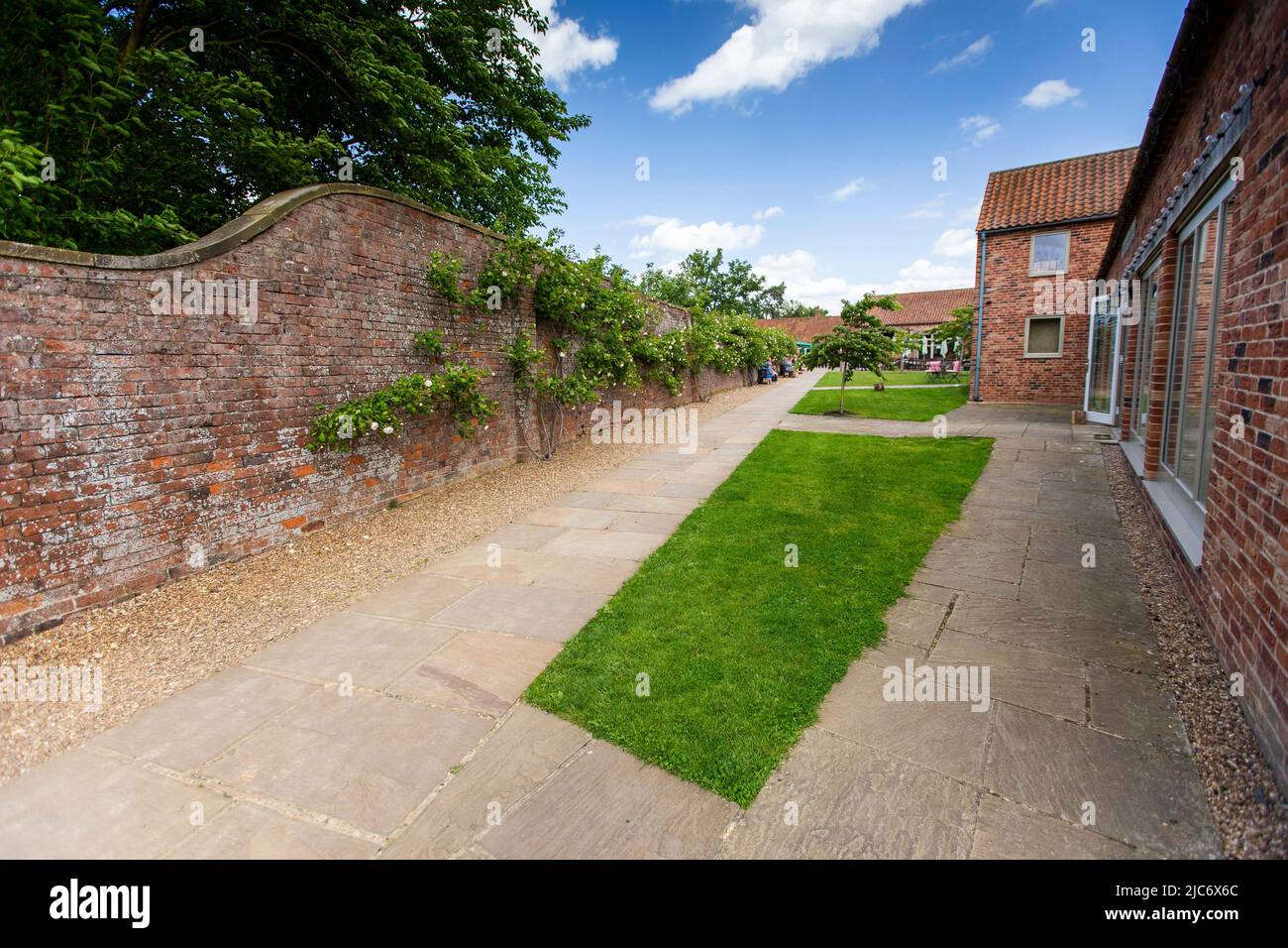 Doddington Hall is, from the outside, an Elizabethan prodigy house or ...