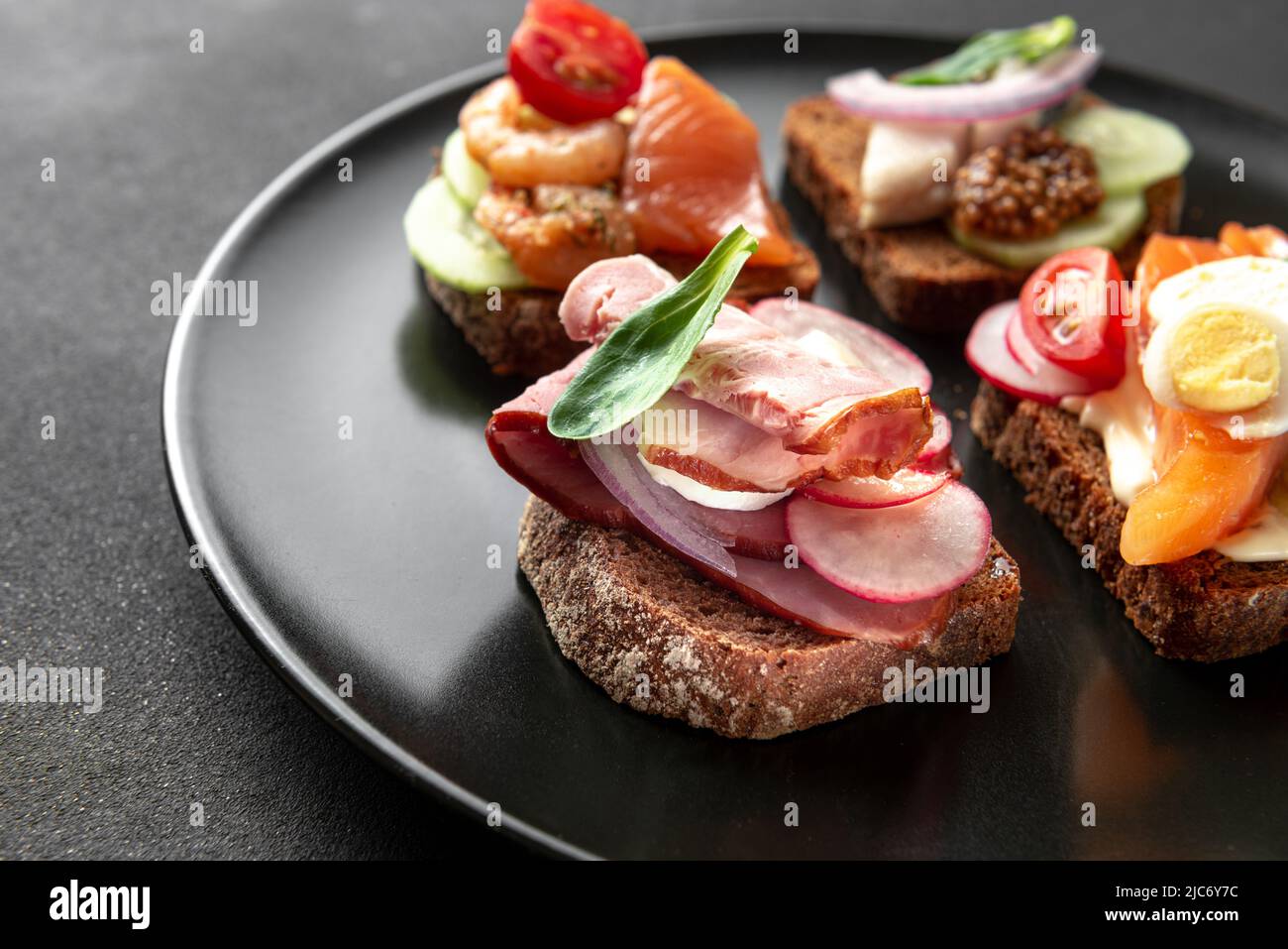 Traditional Danish cuisine. The classic dish of the open smorrebrod ...