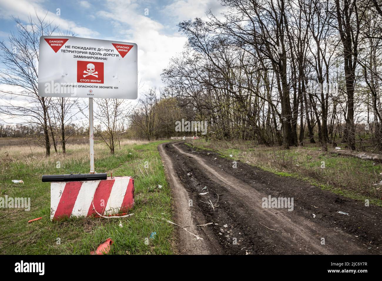 A sign announcing mined territory and a war line. Avdiivka, Donetsk ...