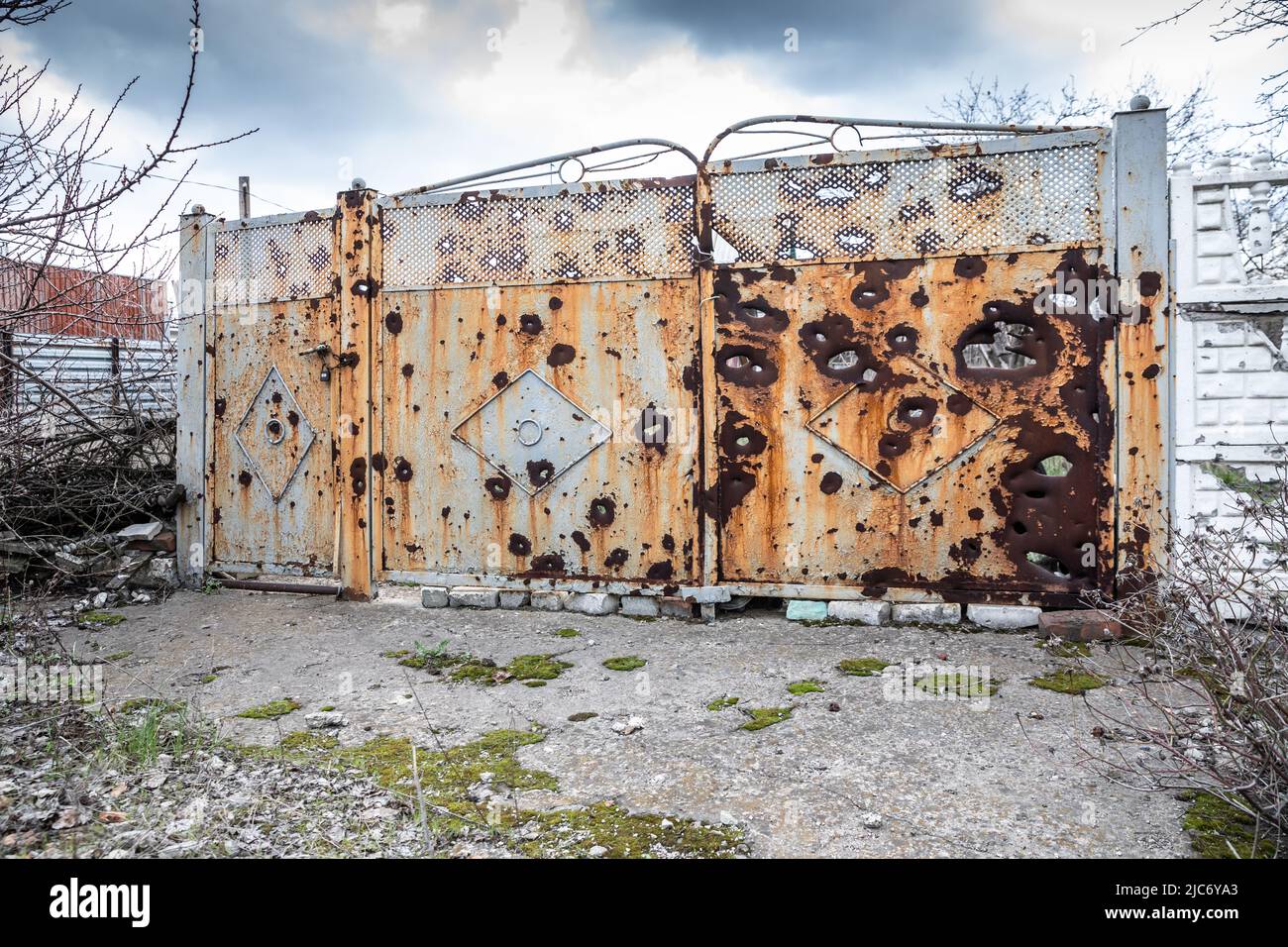 Blasted entrance gate to the house. (CTK Photo/Vojtech Darvik Maca ...