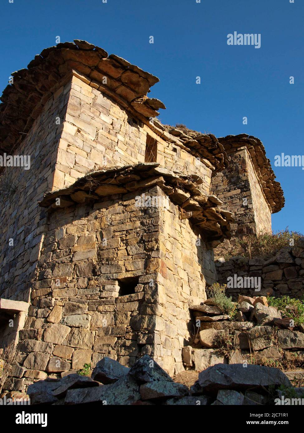 Ruins of the stone citadel of Rupac in the Peruvian Andes. The ...