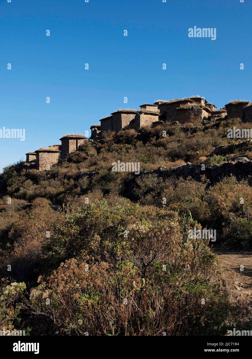 Ruins of the stone citadel of Rupac in the Peruvian Andes. The ...