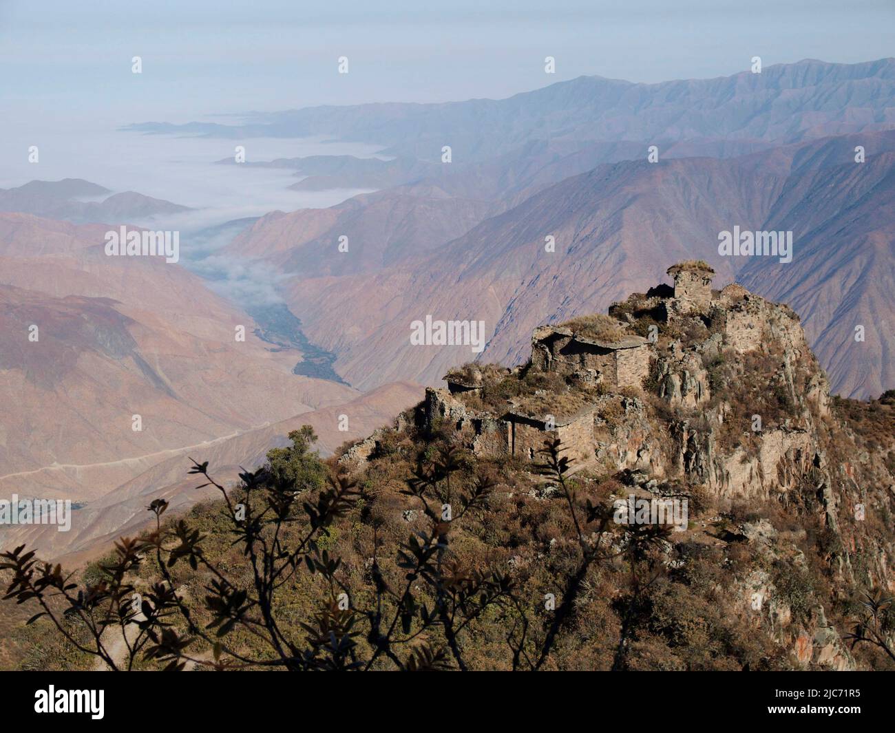 Ruins of the stone citadel of Rupac in the Peruvian Andes. The ...