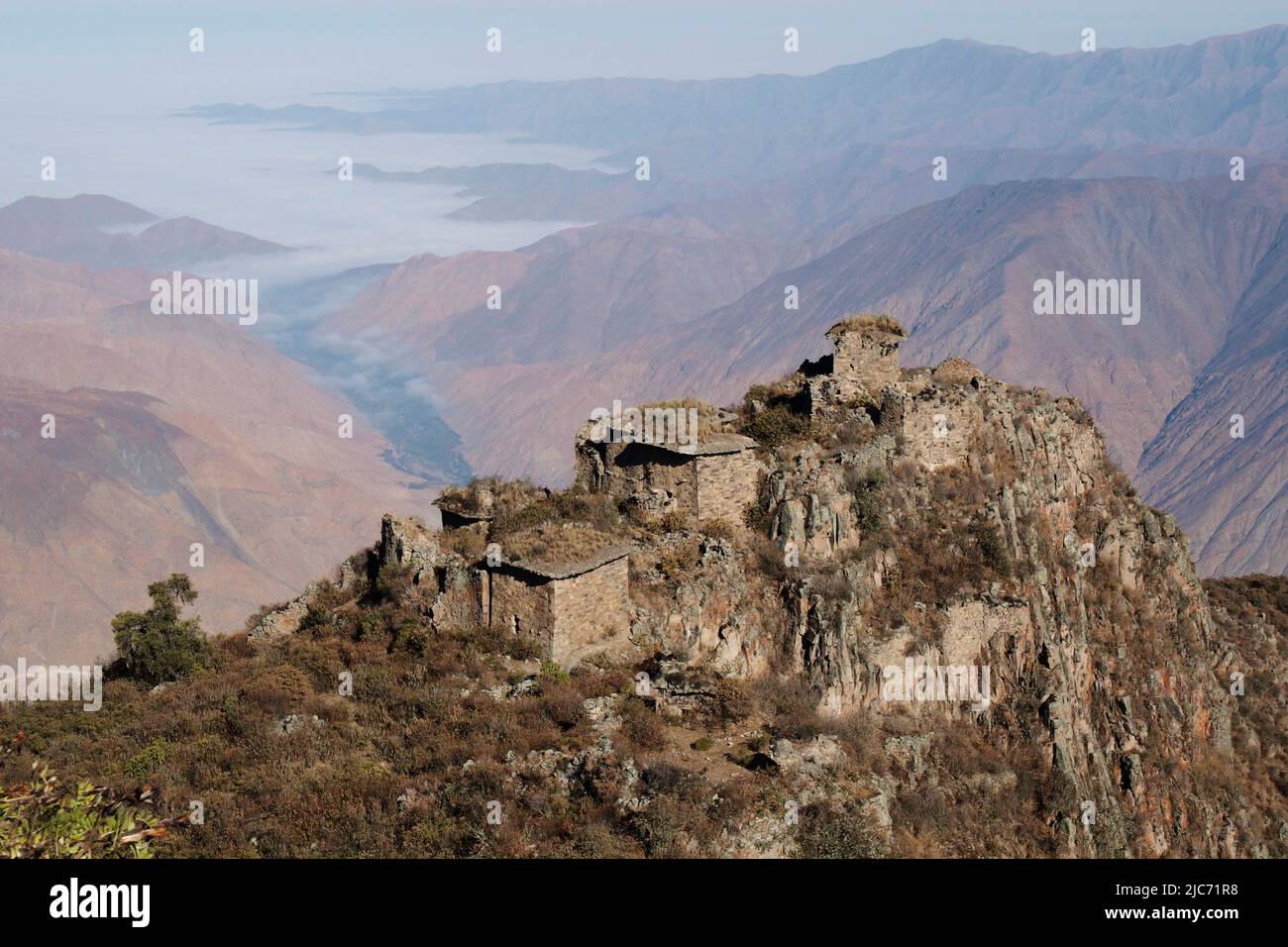 Ruins of the stone citadel of Rupac in the Peruvian Andes. The ...