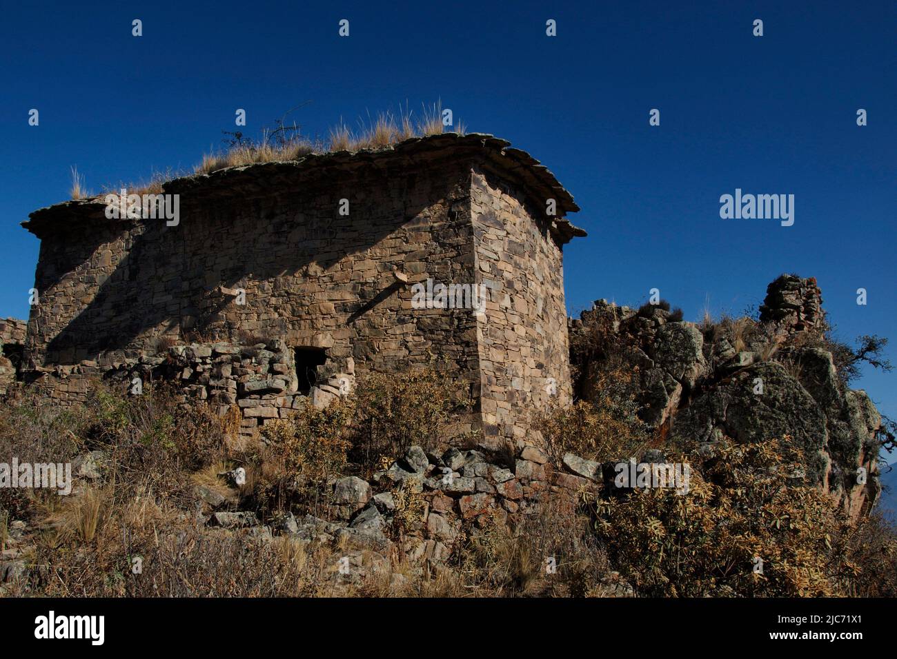 Ruins of the stone citadel of Rupac in the Peruvian Andes. The ...