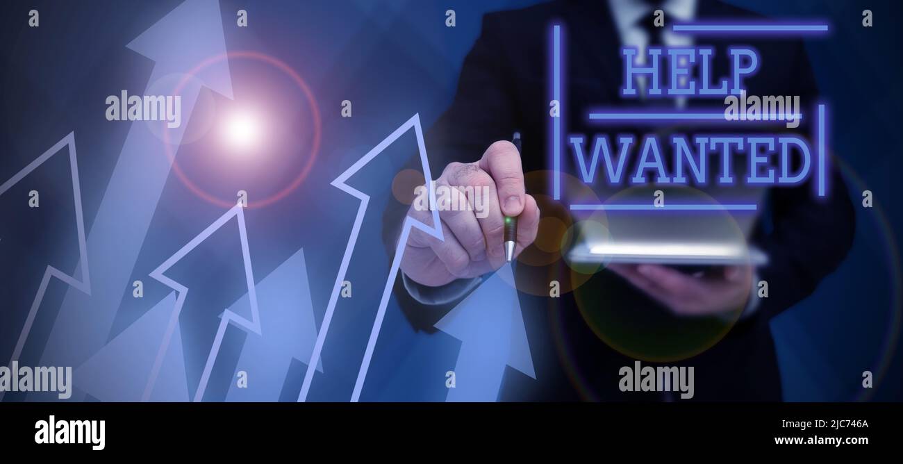 Hand writing sign Help Wanted. Business idea advertisement placed in ...