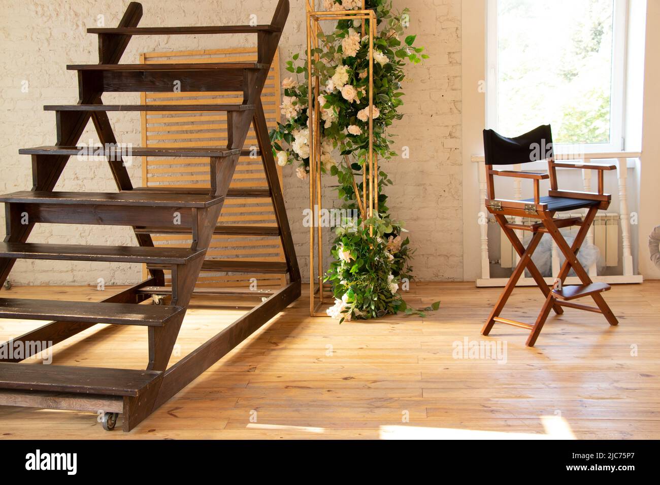 wooden chair and stairs up the window in the apartment, furniture and ...