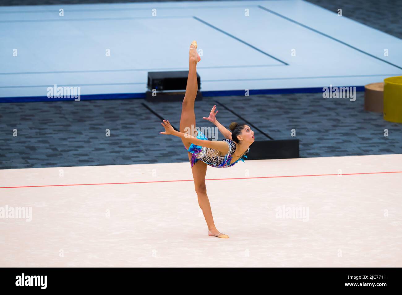 Australian Senior International Rhythmic Gymnast, Ashari Gill standing ...