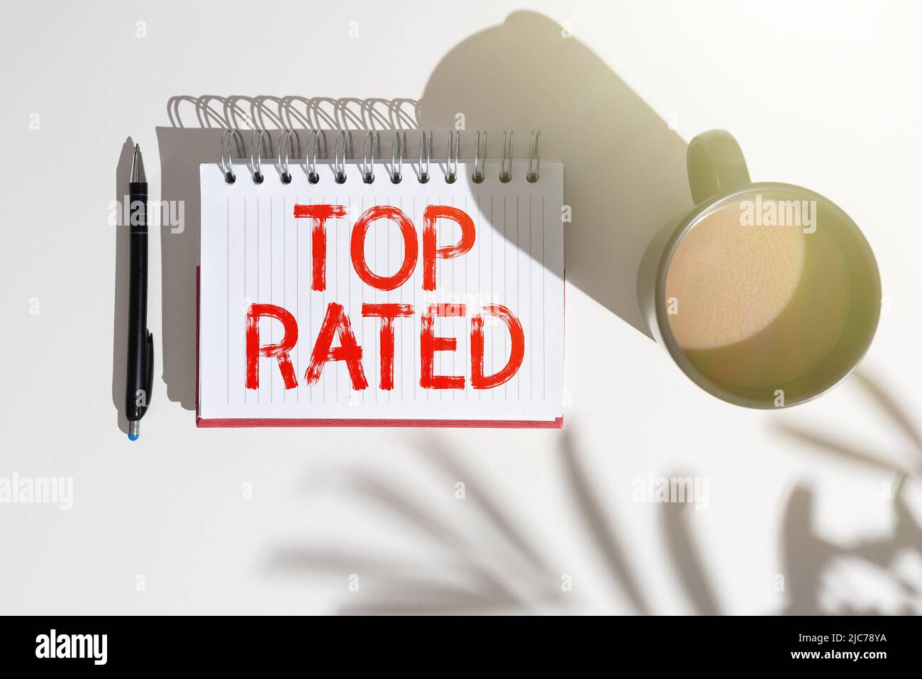 Hand writing sign Top Rated. Concept meaning The high amount of a ...