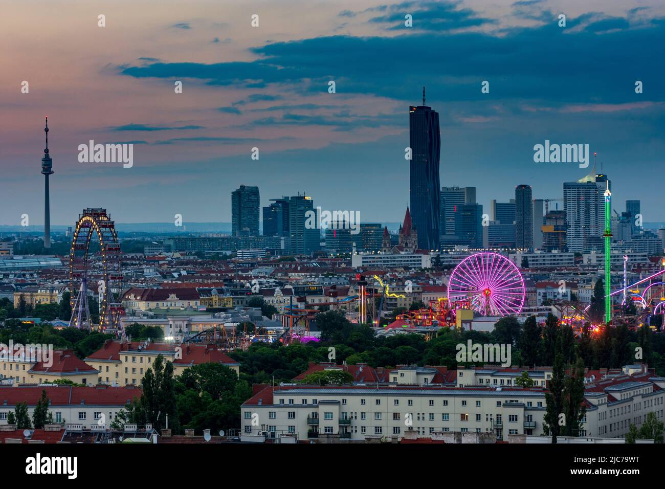 Wien, Vienna: amusement park Prater with Ferris Wheel, tower Donauturm ...