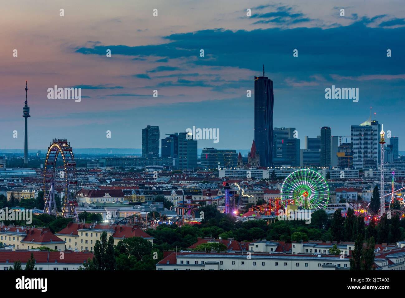 Wien, Vienna: amusement park Prater with Ferris Wheel, tower Donauturm ...