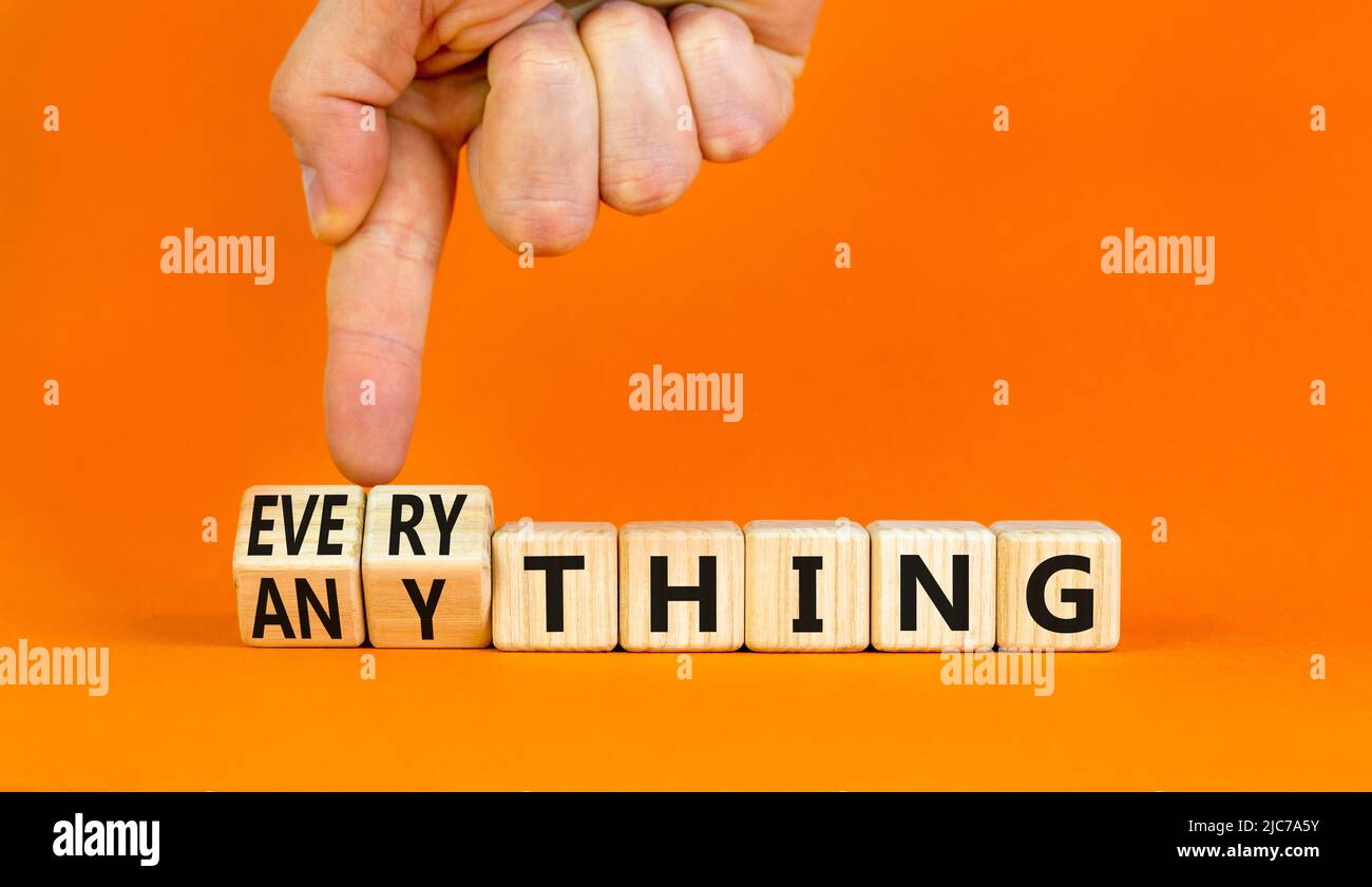 Anything or everything symbol. Businessman turns cubes, changes the ...