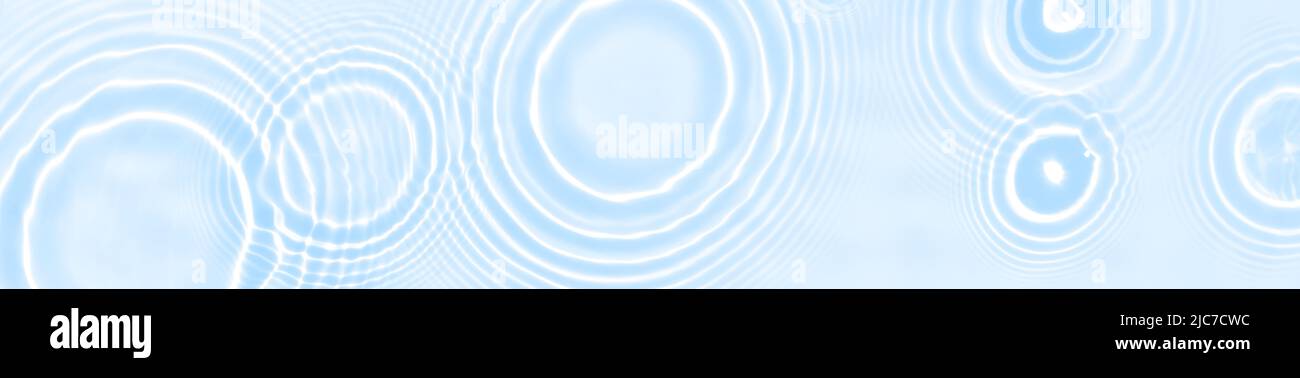 The surface of light on the light blue transparent swimming pool water ...