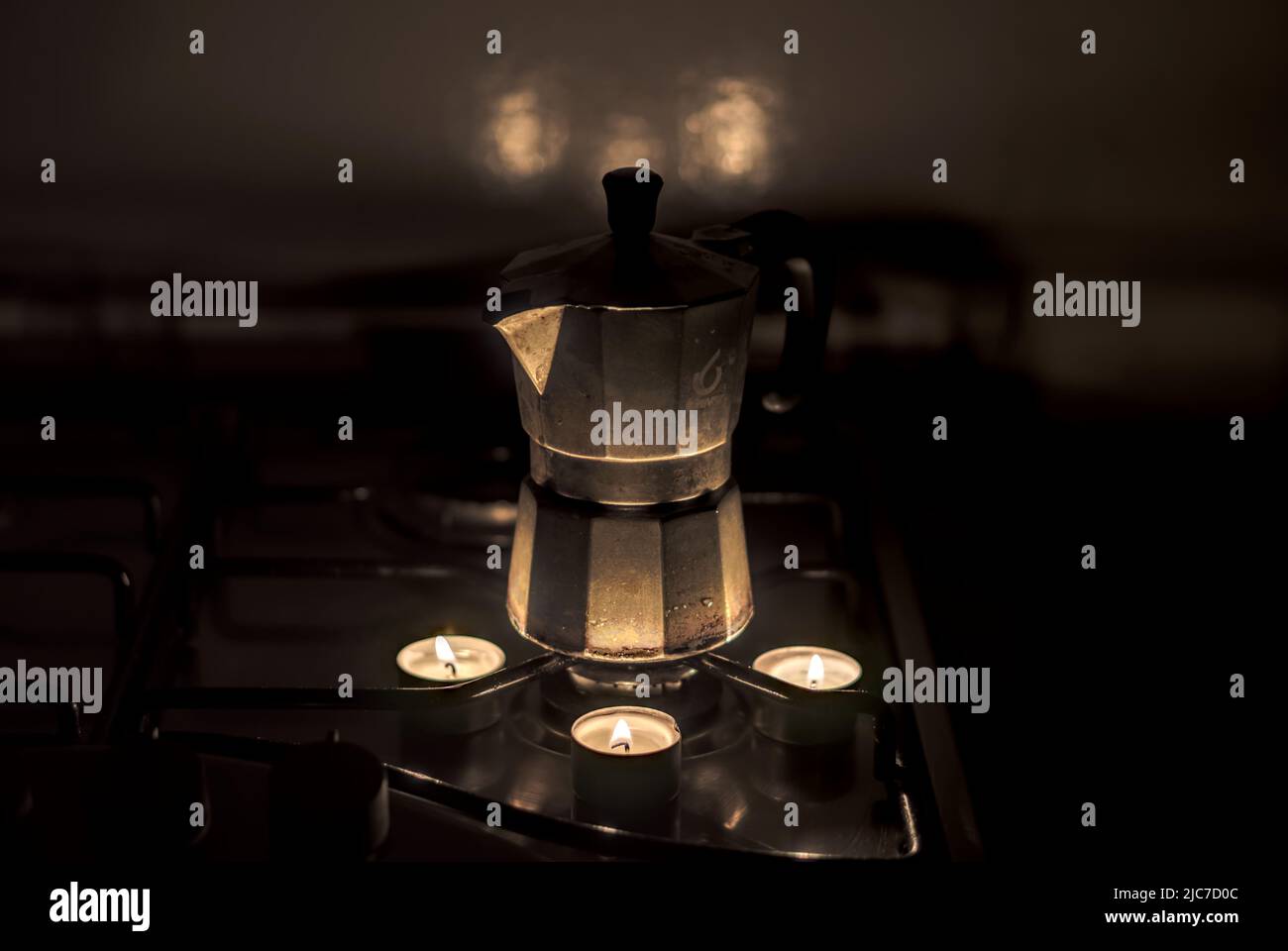 Coffee machine powered by candles because of gas shortage Stock Photo ...