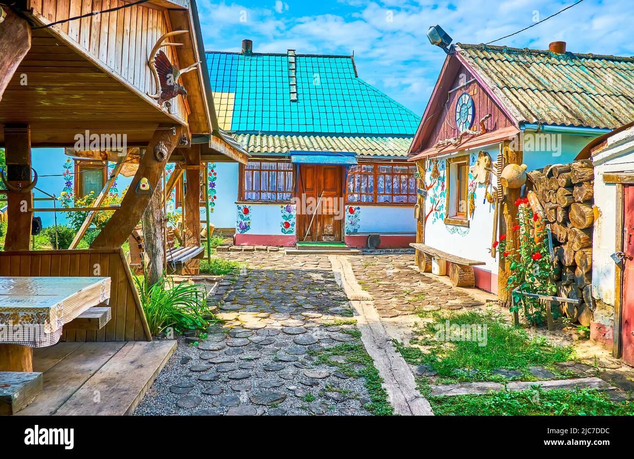 Traditional Ukrainian rural courtyard of farmstead with whitewashed ...