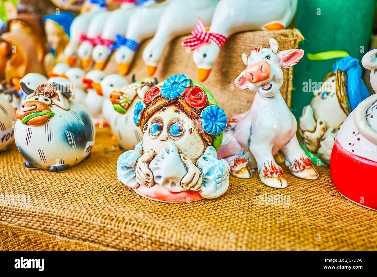 Funny handicraft ceramic toys in traditional Ukrainian style on ...