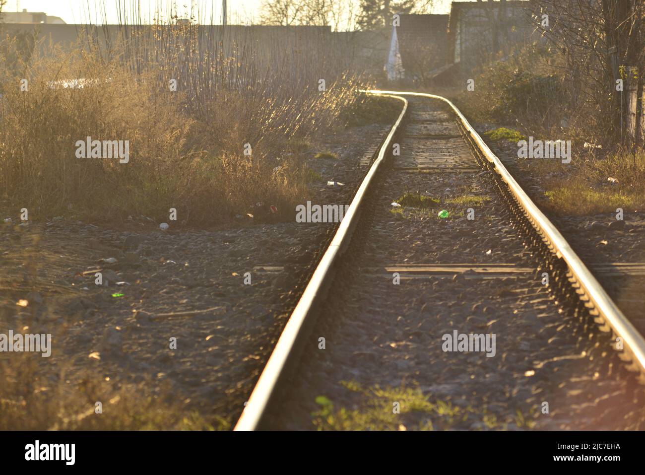 Backlight railway track Stock Photo - Alamy