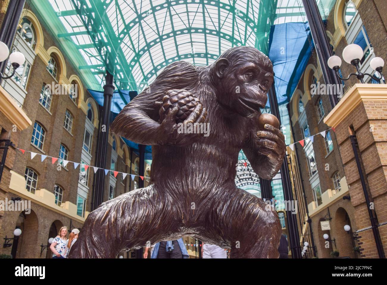 London, UK. 10th June, 2022. A chimp sculpture is seen outside Hay's ...