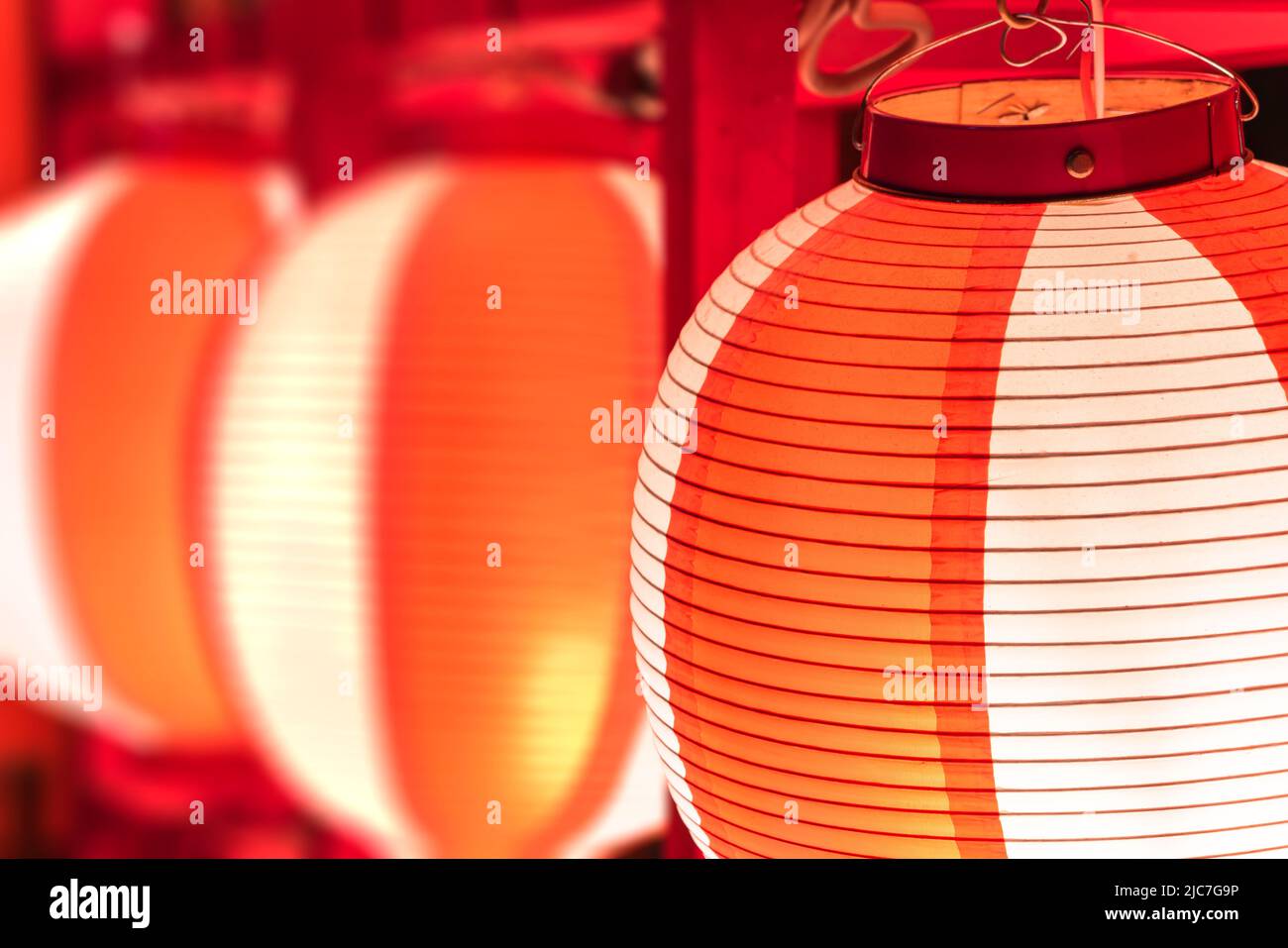 Close up on Japanese paper lanterns colored in auspicious colors red ...
