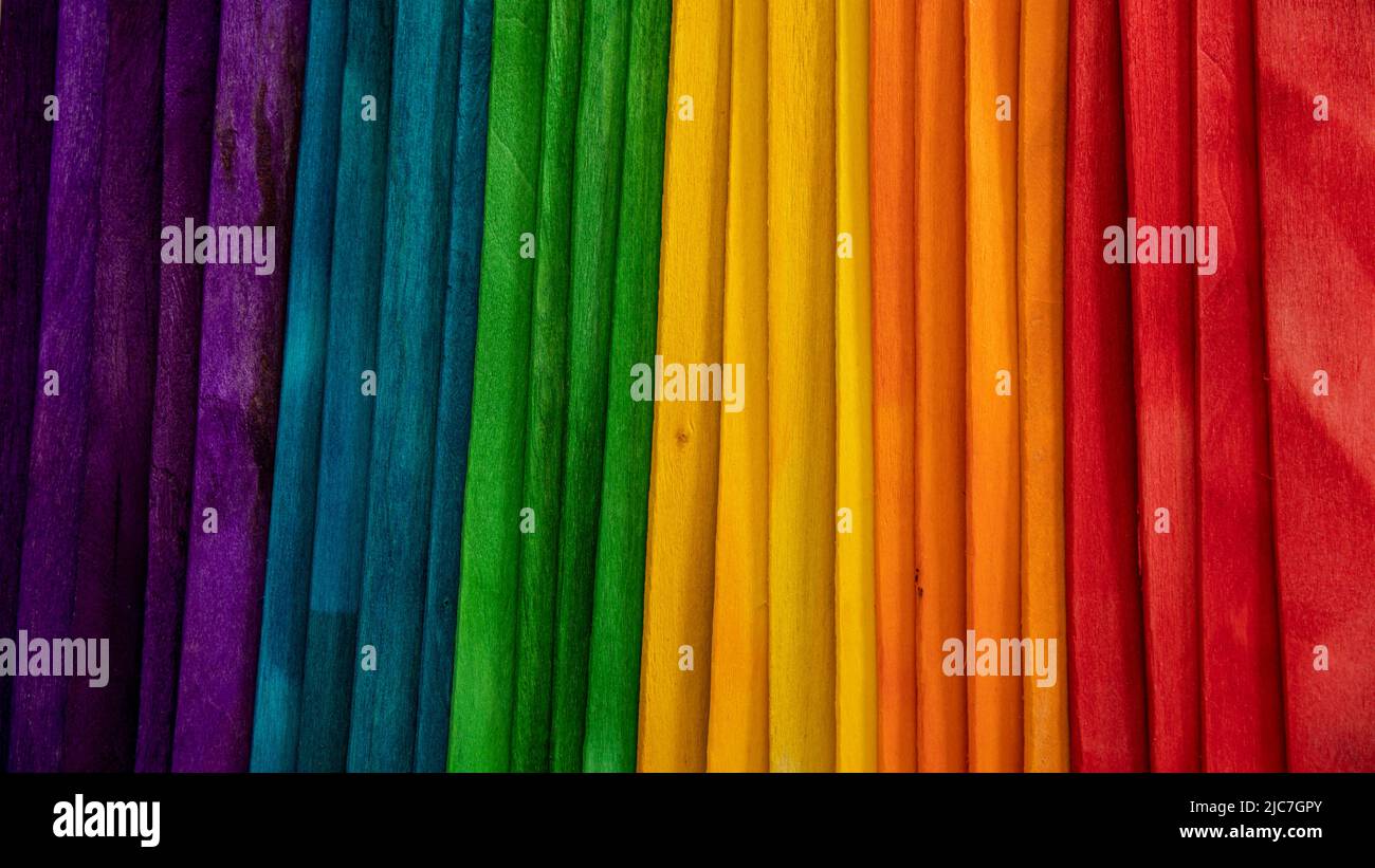Rainbow gay flag made with wooden sticks creating a texture ideal for ...